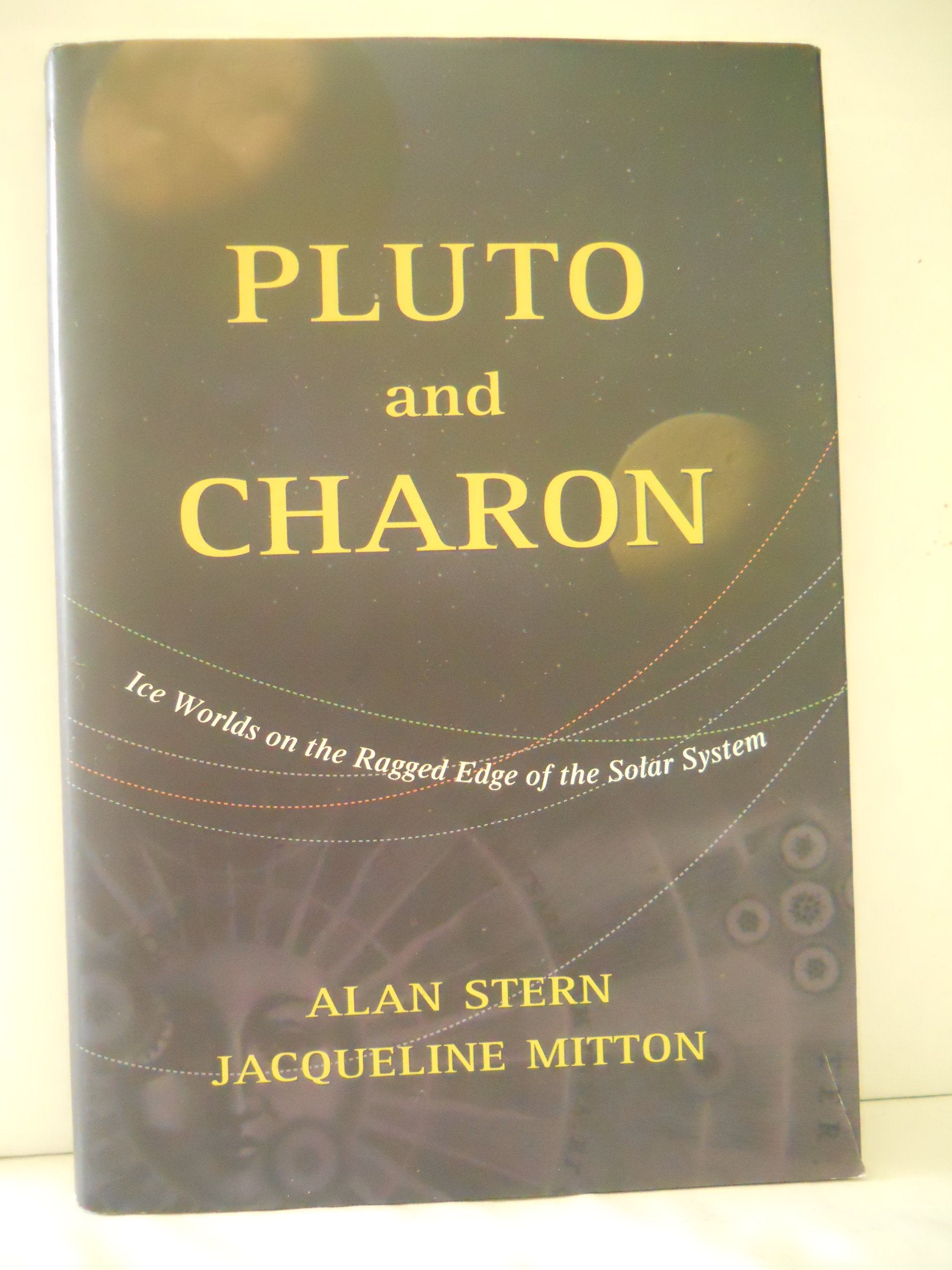 Pluto and Charon: Ice Worlds on the Ragged Edge of the Solar System ...